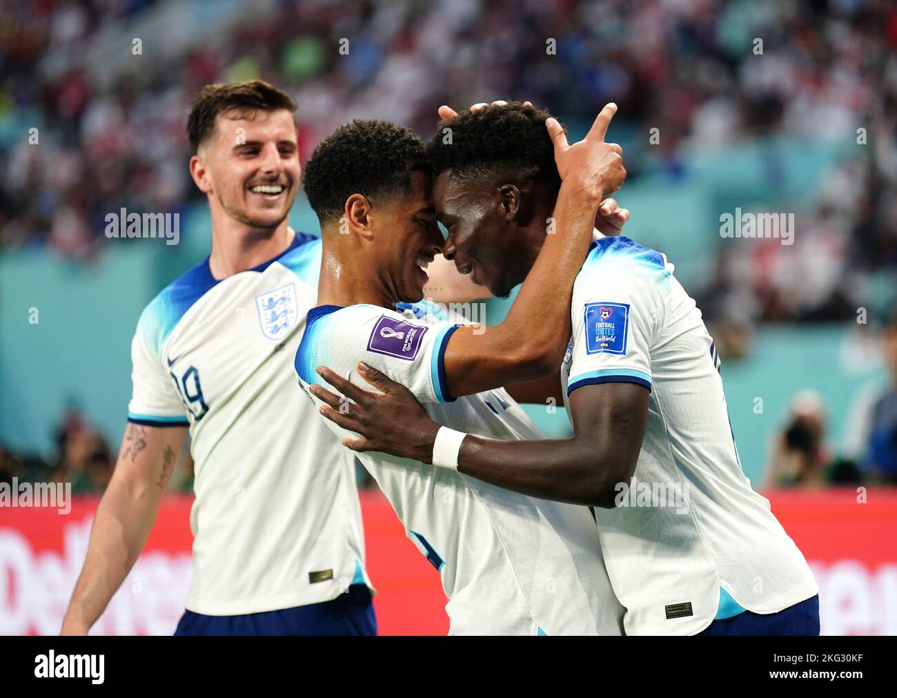 England's Bukayo Saka (right) celebrates scoring their side's second ...