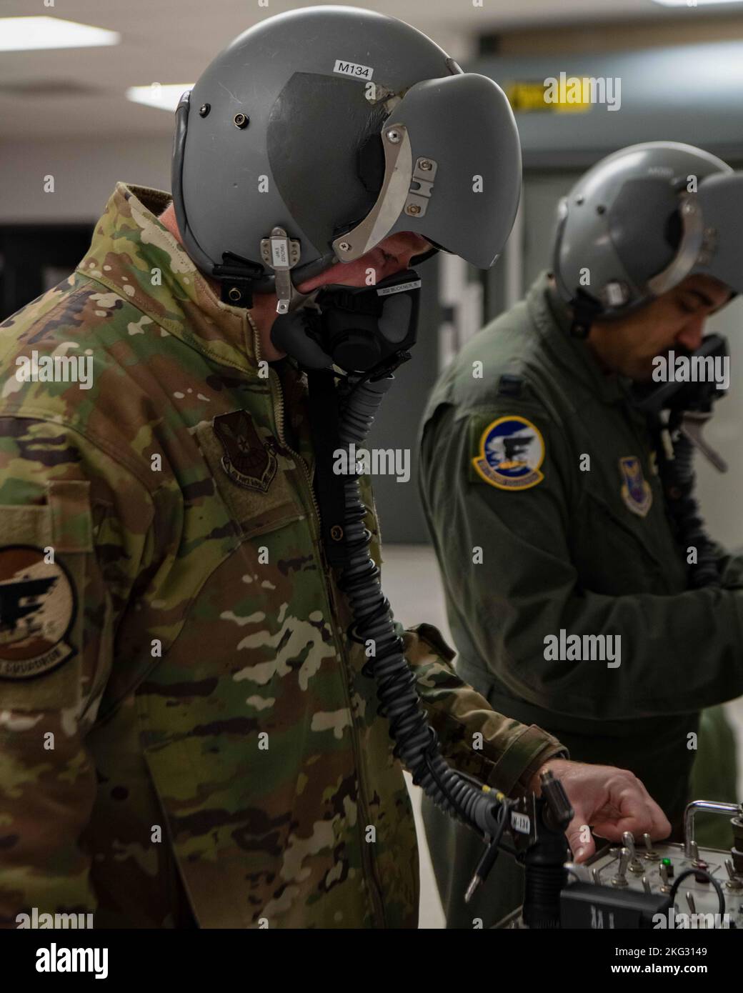 Airmen with the 69th Bomb Squadron conduct a preflight check on their ...