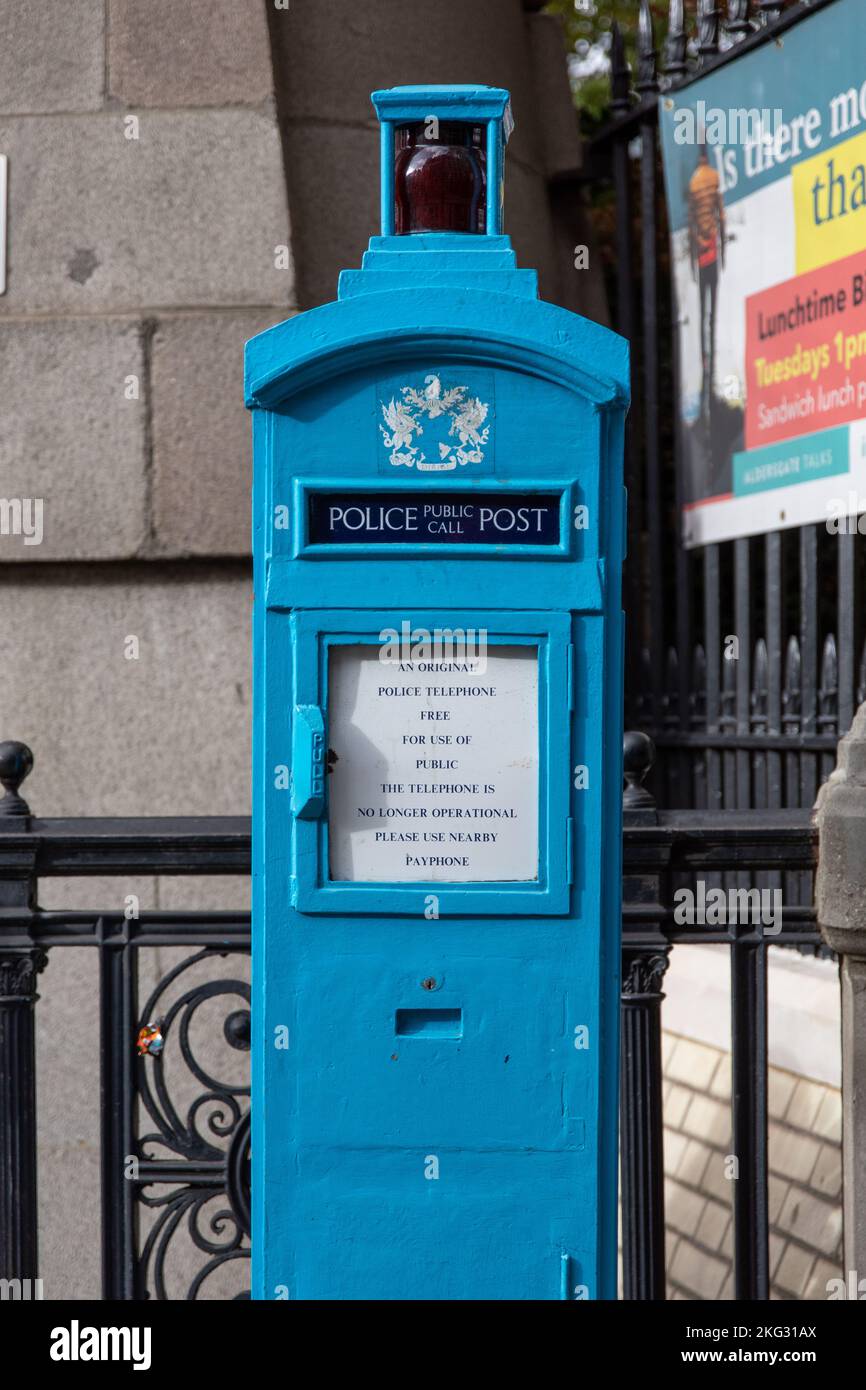 A public police telephone box outside Postman's Park Stock Photo - Alamy