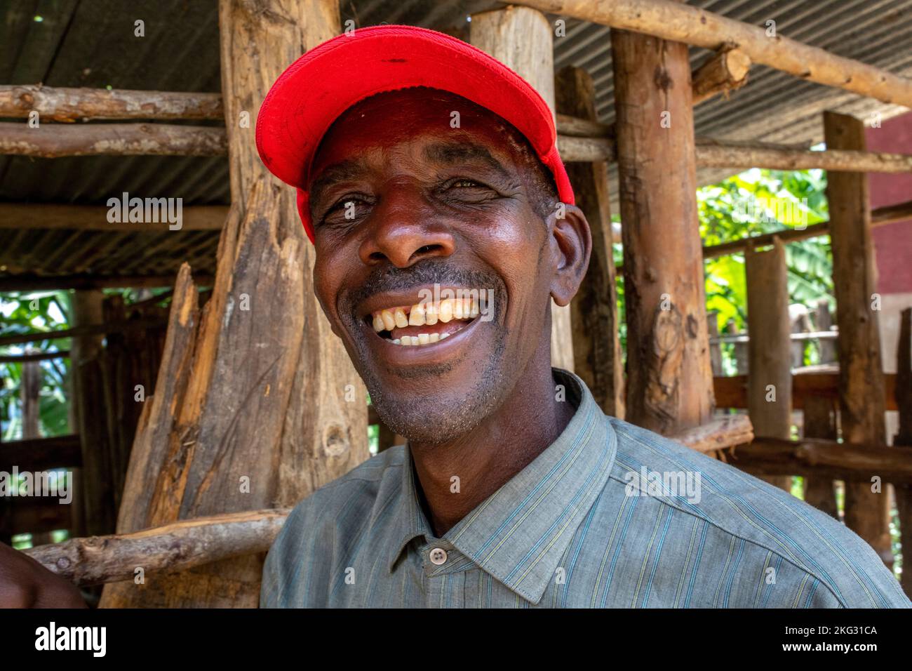 Member of Abakundakawa coffee grower's cooperative in his house in ...