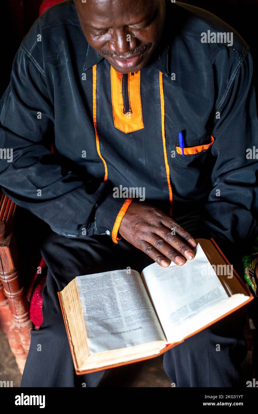 Bible reading at home in a village near Gicumbi, northern province ...