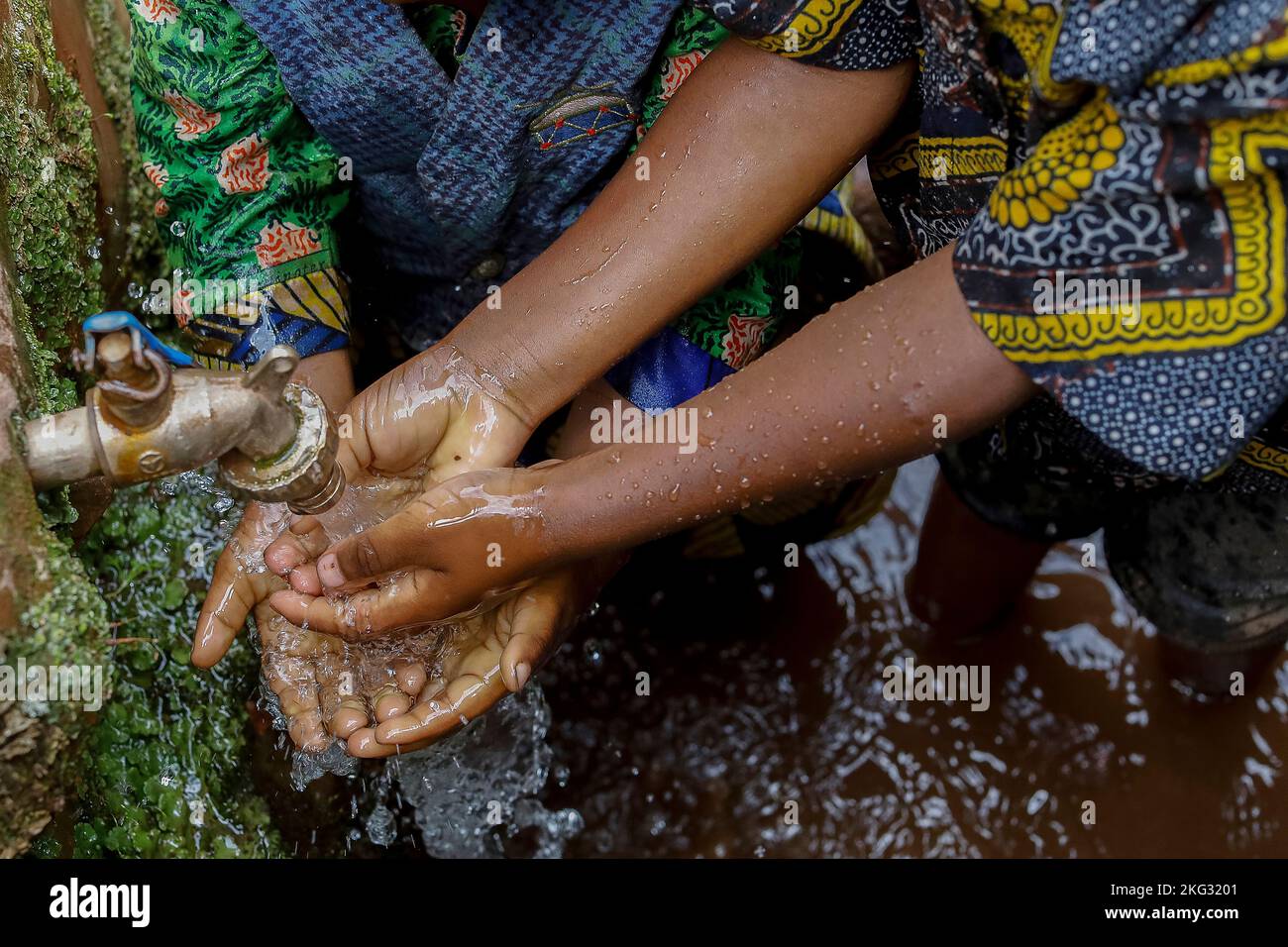 Children washing their hands in a village near Gicumbi, northern ...