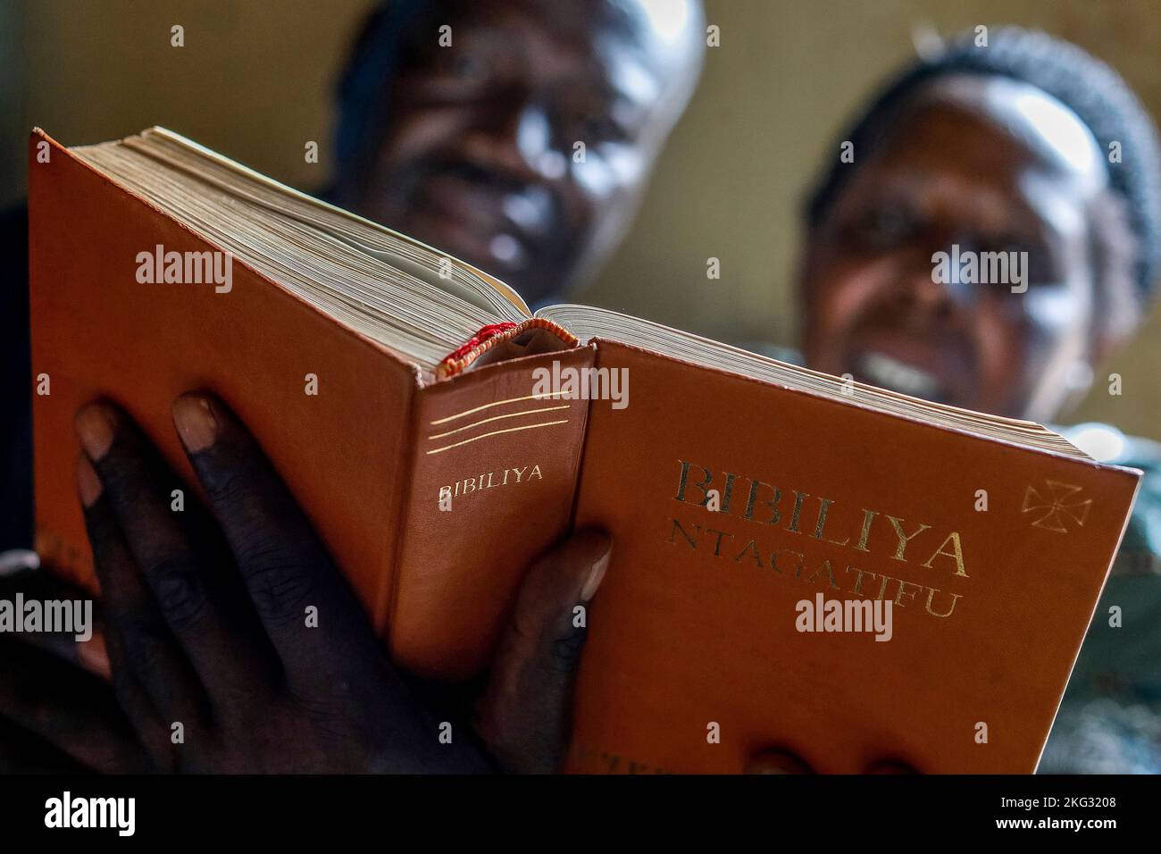 Bible reading at home in a village near Gicumbi, northern province ...