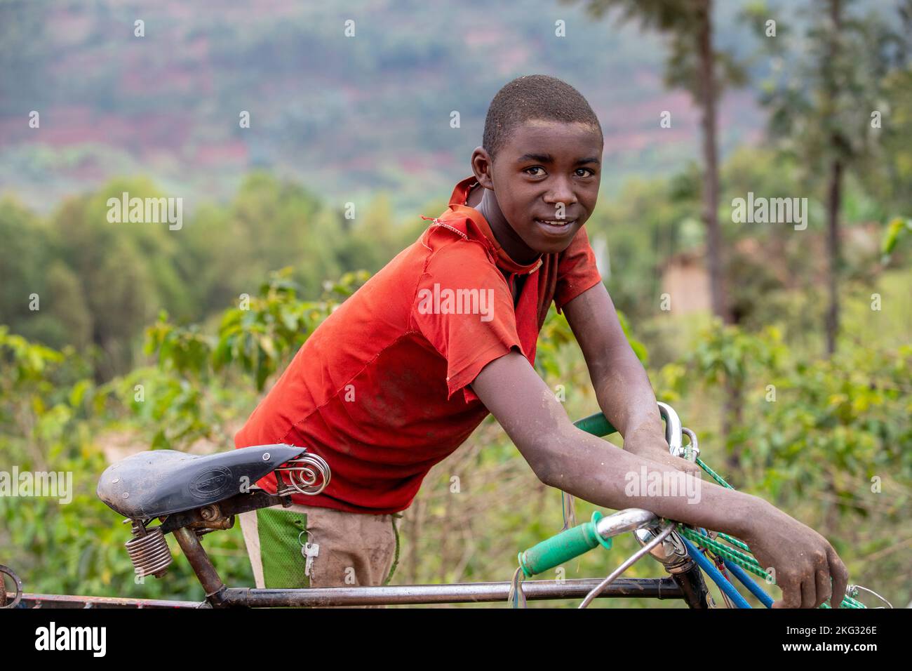 Boy with bike in southern Rwanda Stock Photo - Alamy