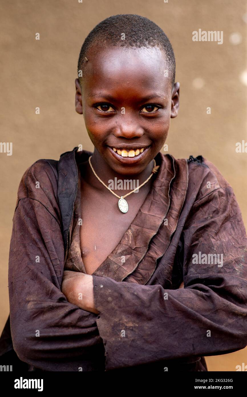 Smiling boy with arms crossed in southern Rwanda Stock Photo - Alamy