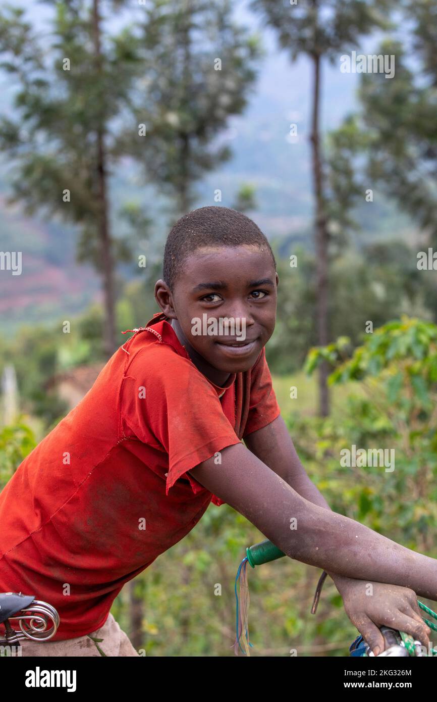 Boy with bike in southern Rwanda Stock Photo - Alamy