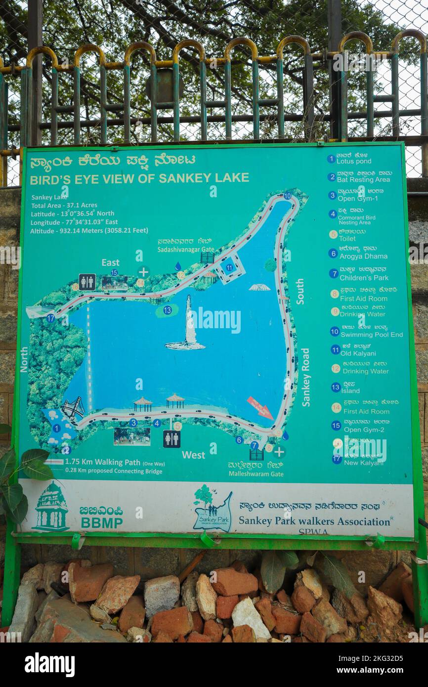 A vertical shot of a blue banner with a map of Sankey tank in India in ...