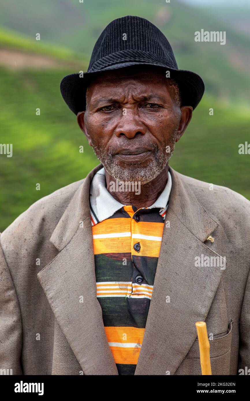 Elderly man standing in western Rwanda Stock Photo - Alamy