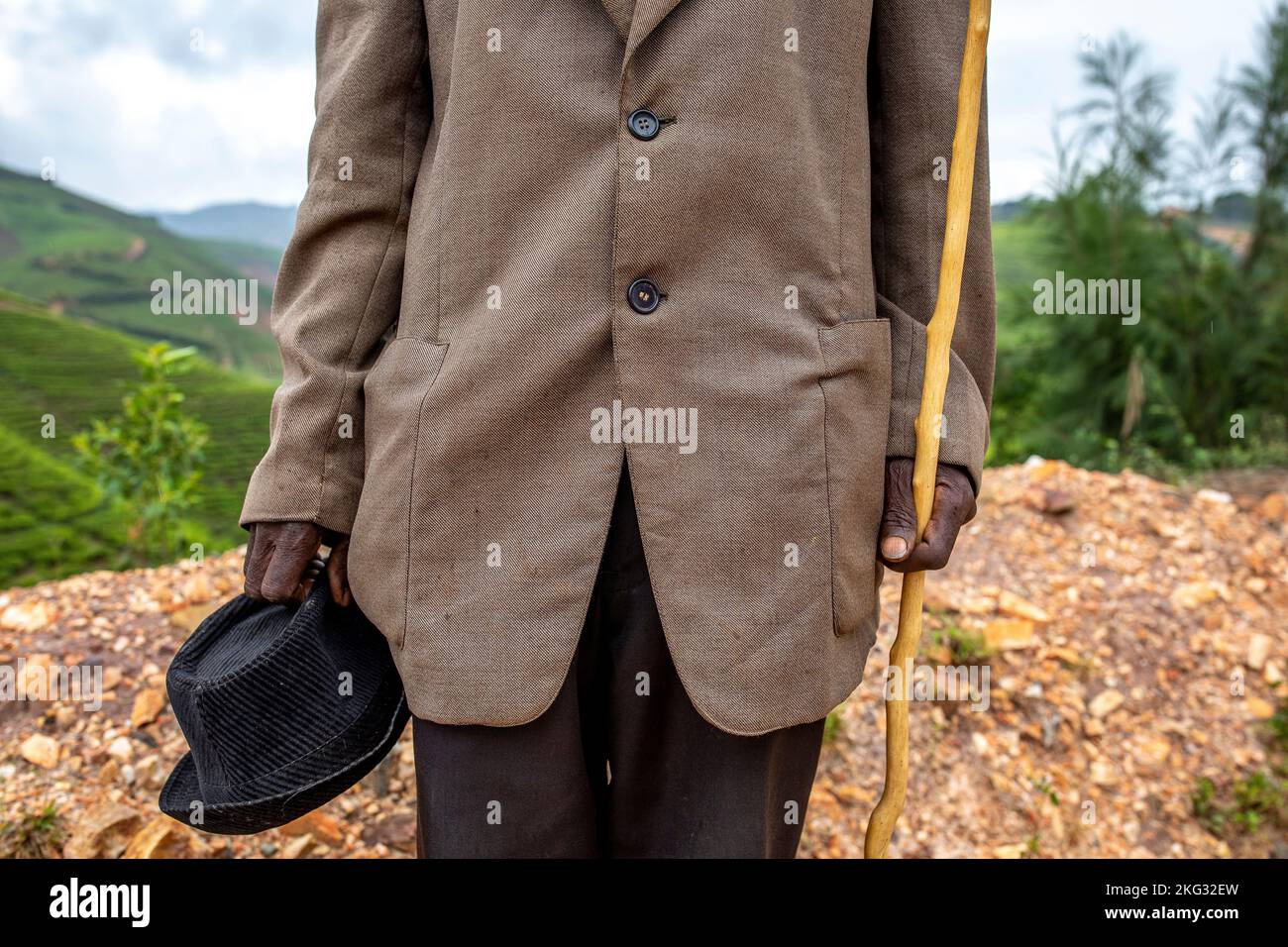 Elderly man standing in western Rwanda Stock Photo - Alamy