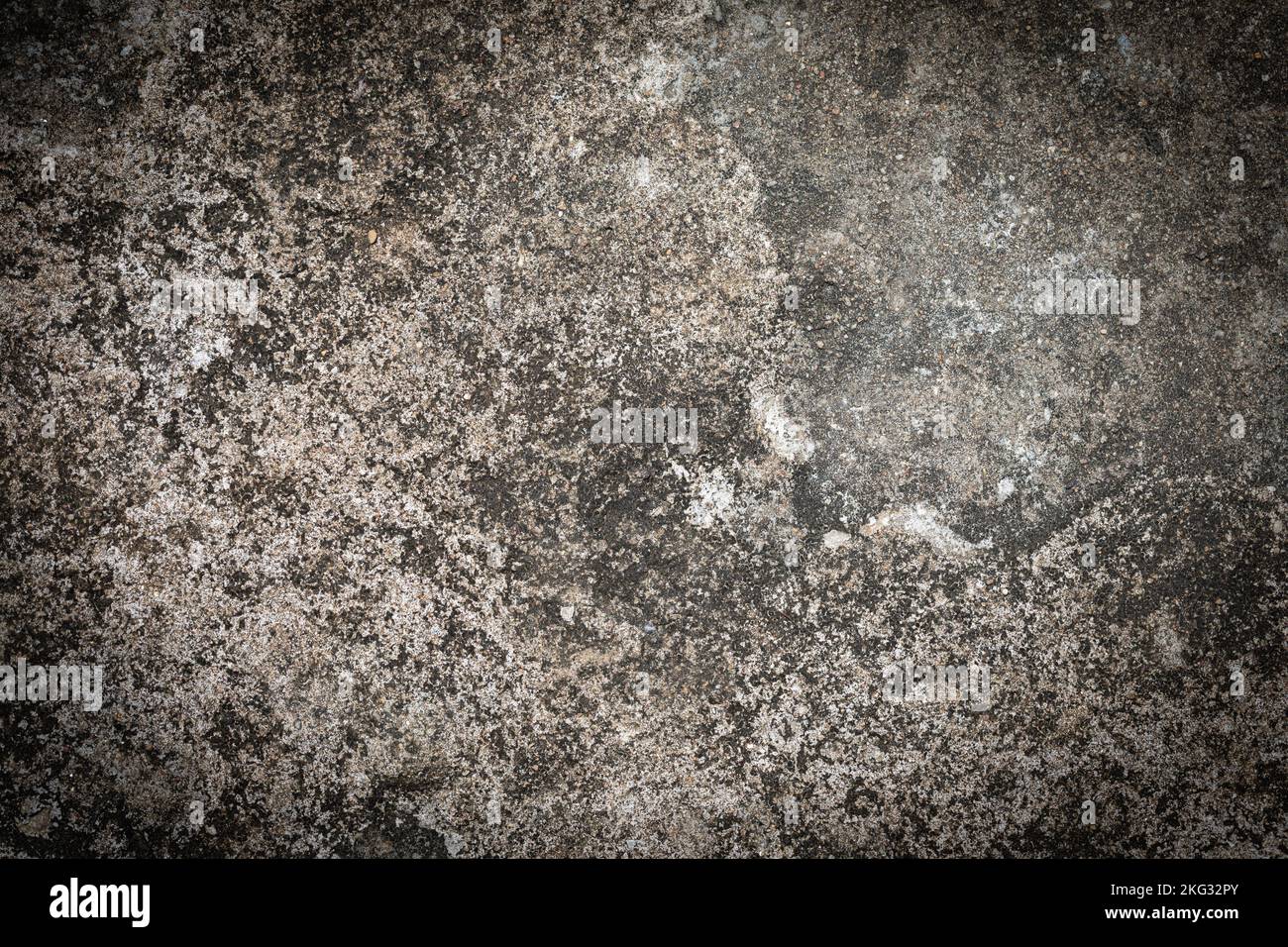 Gray textured cement wall background with fine concrete chips ...