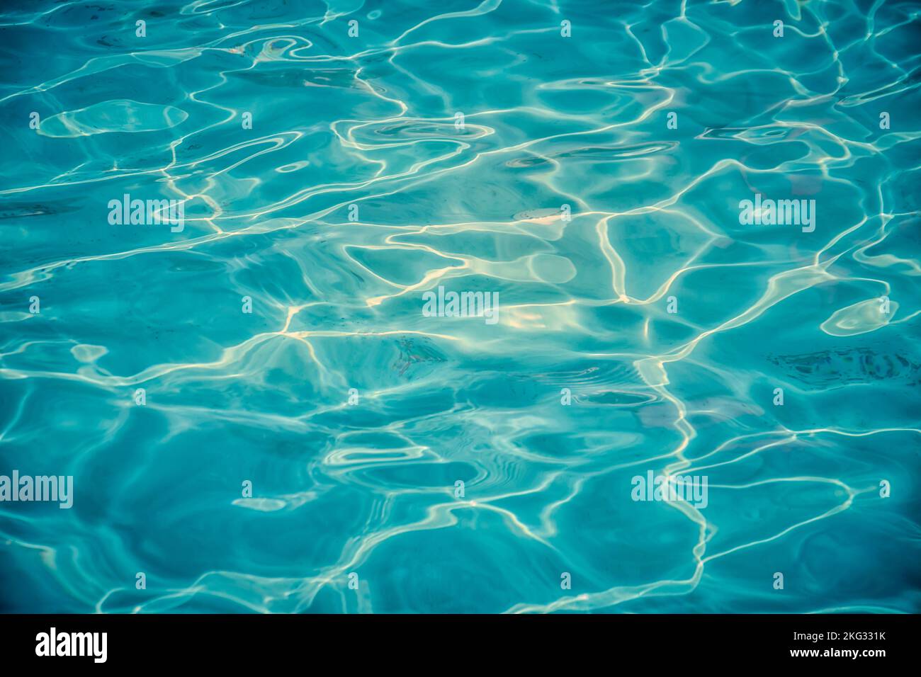 Azure clear water in a swimming pool with sun reflecting Stock Photo ...
