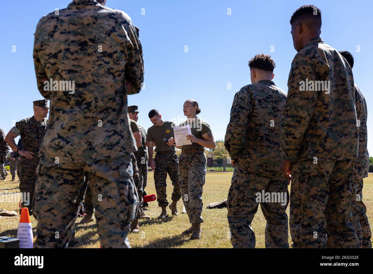 U.S. Marine Corps Cpl. Morgan Poland with Headquarters Battalion, Marine Force Reserve, gives a ...