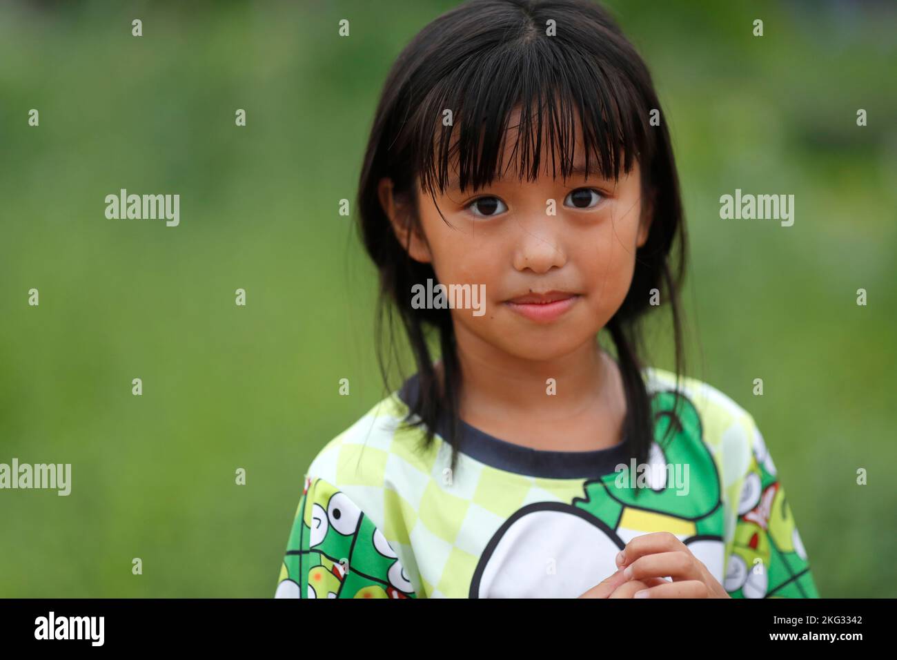 Portrait of a young smiling vietnamese girl. Hoi An. Vietnam Stock ...