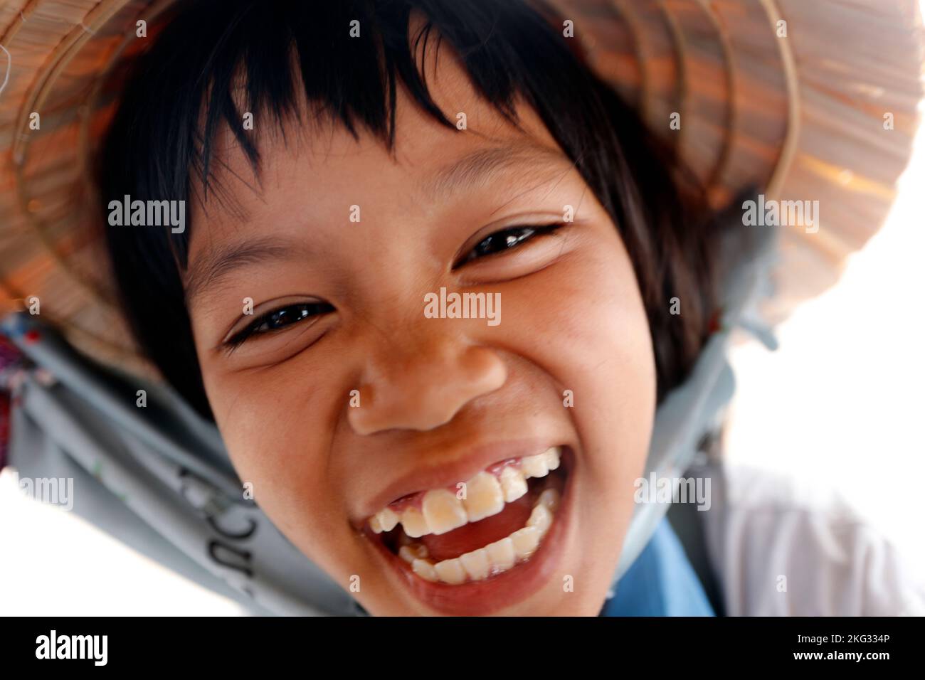 Portrait of a young smiling vietnamese girl. Tan Chau. Vietnam Stock ...