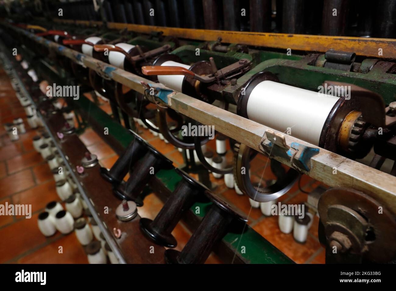 A traditional silk factory. Bobbins of silk threads. Tan Chau. Vietnam ...