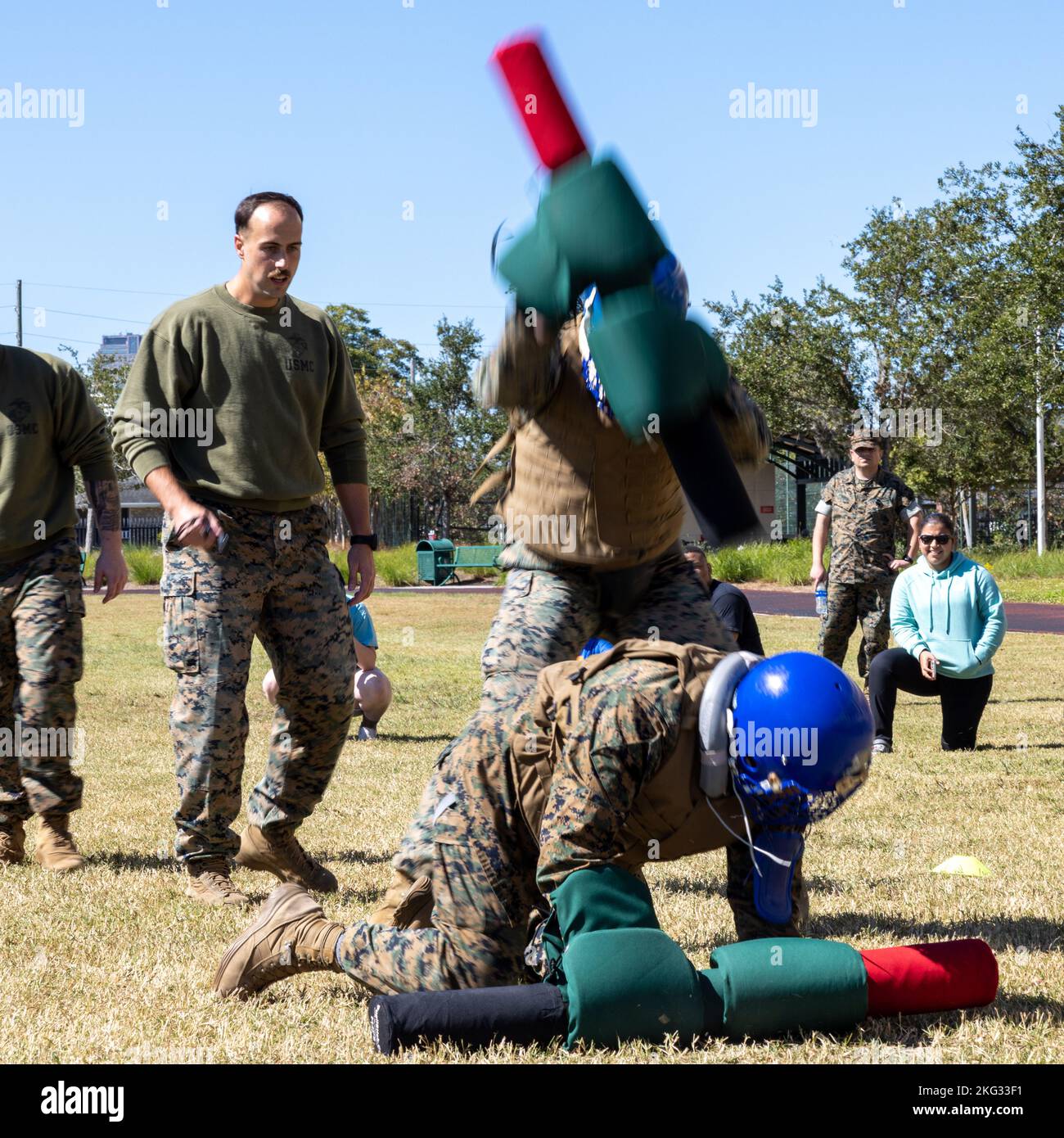 U.S. Marines with Headquarters Battalion, Marine Force Reserve, take part in a pugil stick ...