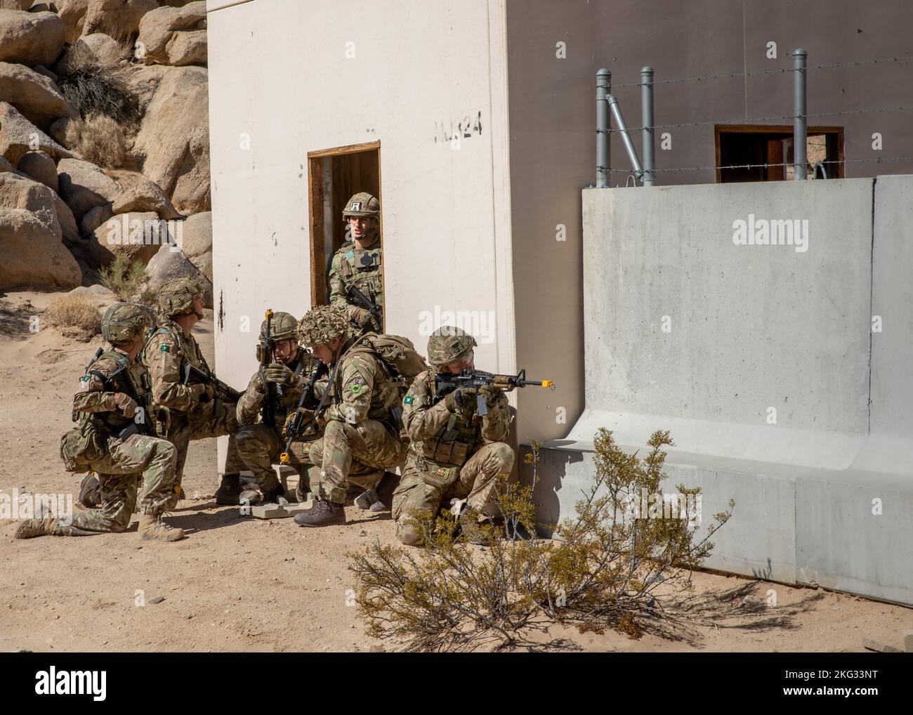 British Soldiers from the Experimental Trials Group assault through a ...