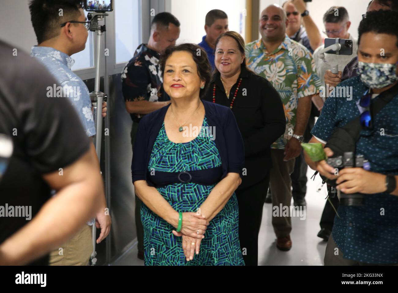 Guam Governor Lou Leon Guerrero (center), government officials, and ...