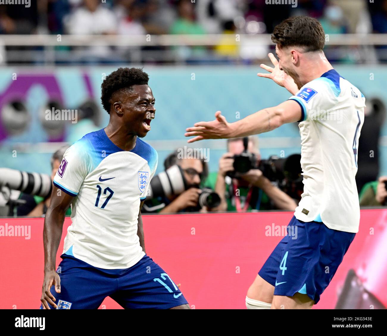 England's #17 Bukayo Saka celebrates with teammate Declan Rice after ...