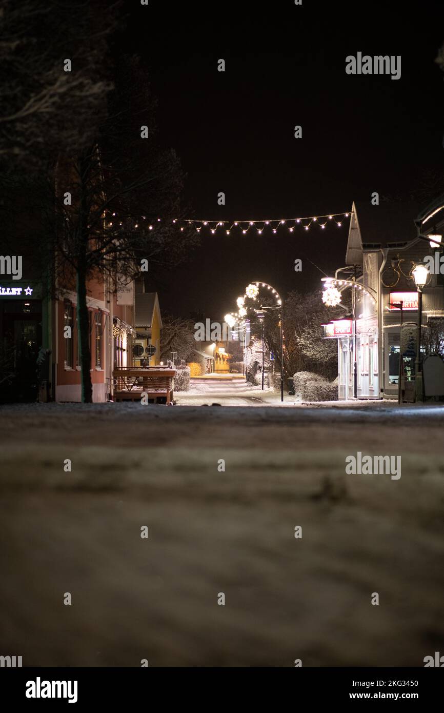 Snow and winter night in a small Swedish towns main road Stock Photo ...