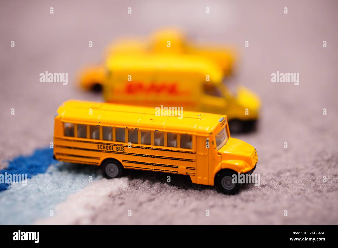 A row of branded toy model vehicles including Hot Wheels and Siku Stock ...