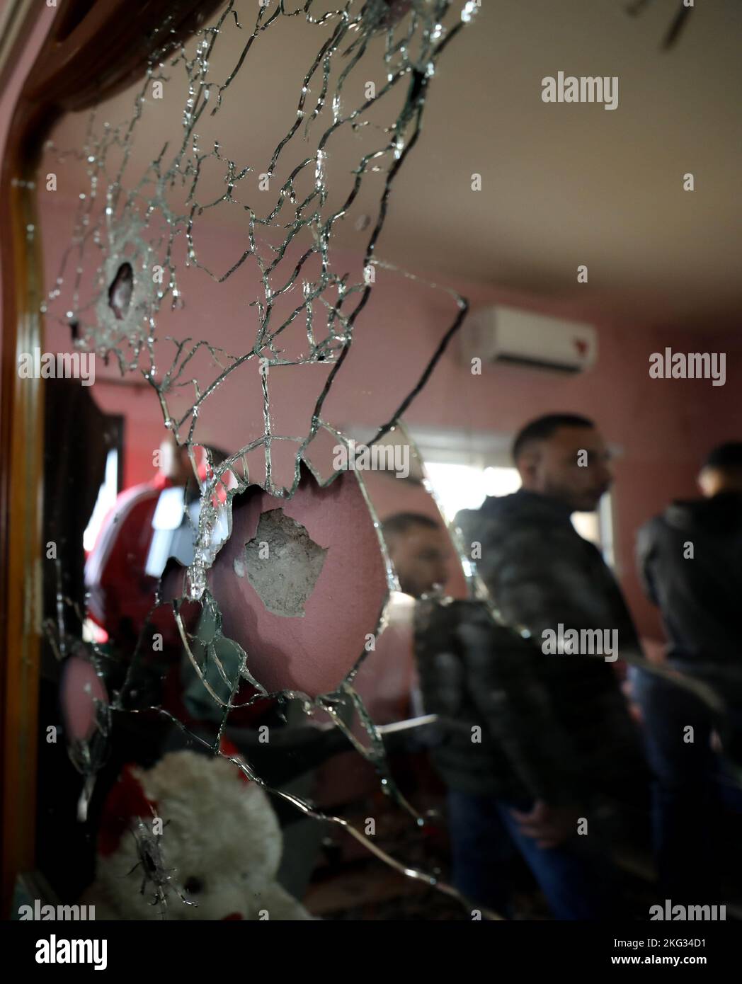 Jenin, West Bank city of Jenin. 21st Nov, 2022. A damaged mirror is ...