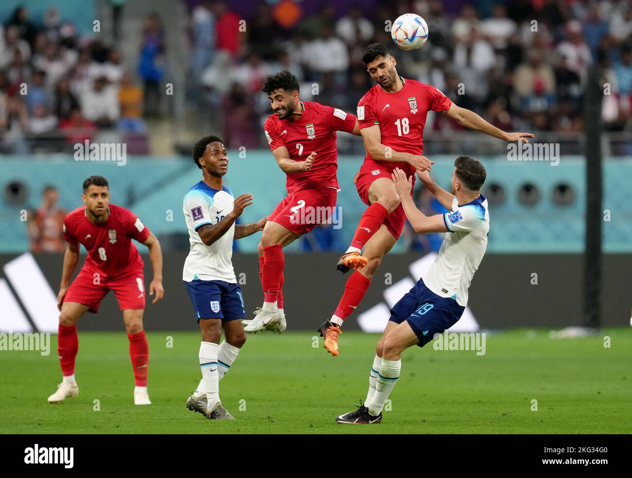 Iran's Sadegh Moharrami and Ali Karimi battle with England's Mason ...