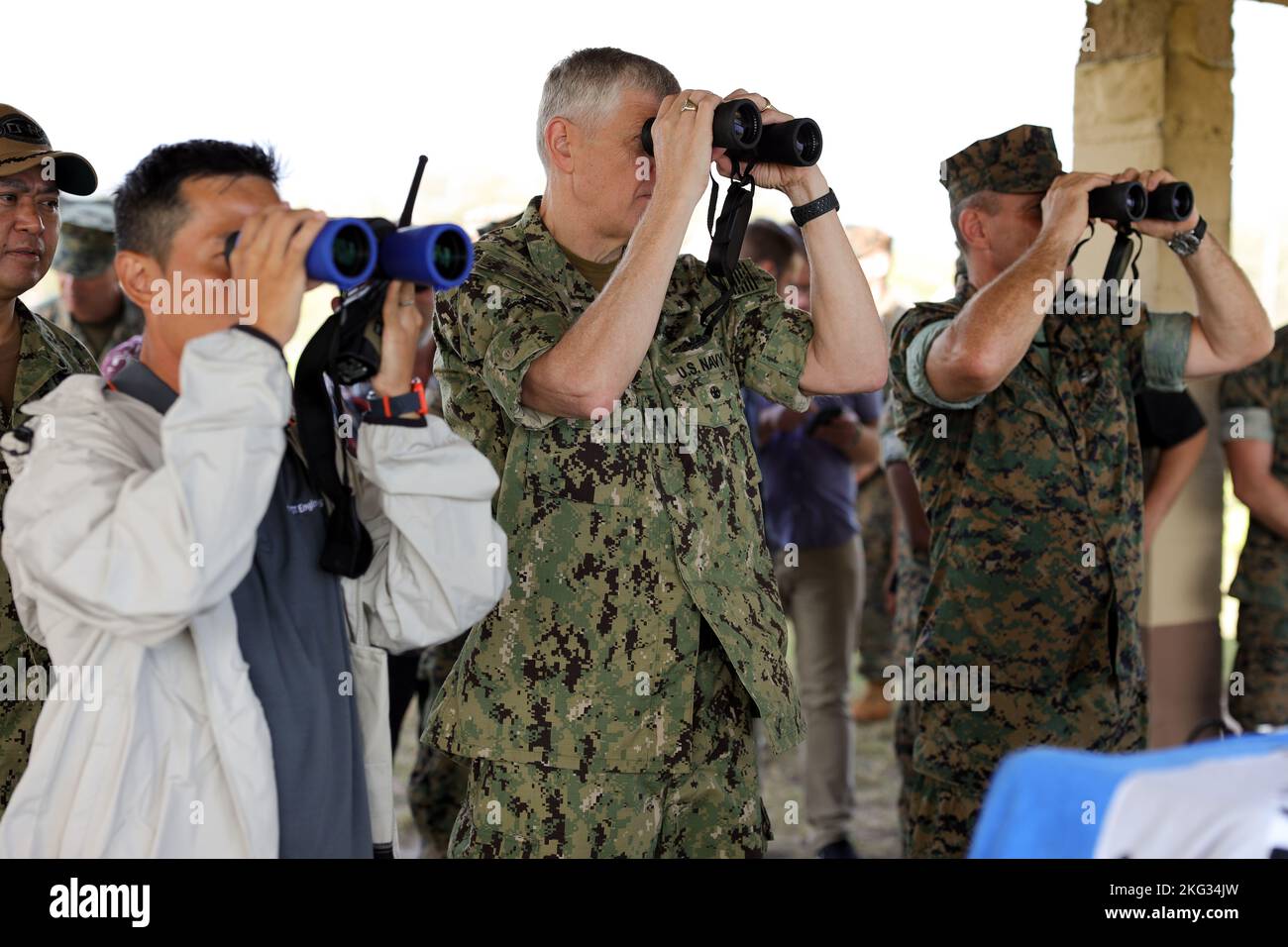 NG Chee Wee, left, ST Engineering, Rear Adm. Lorin Selby, center, chief ...
