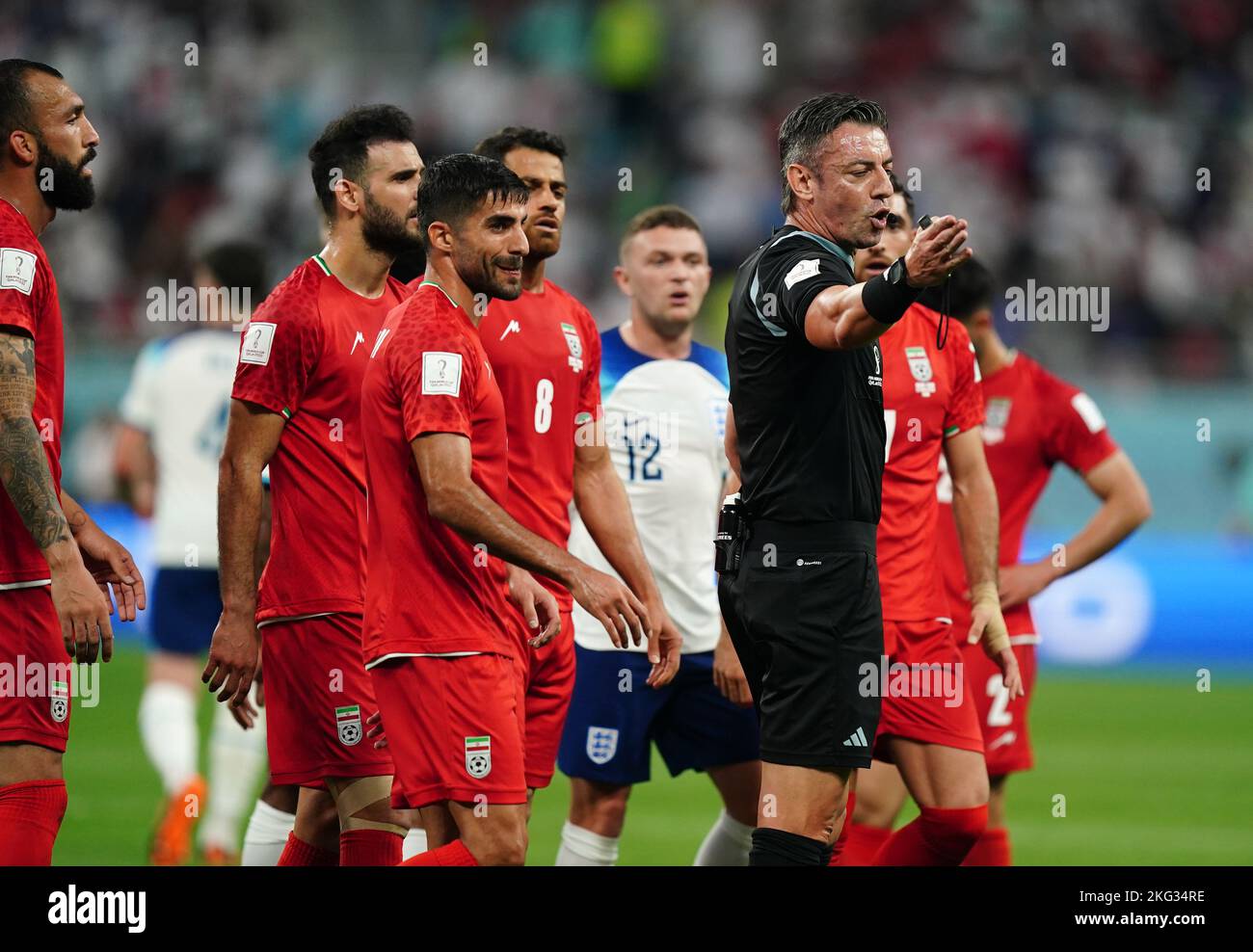 Iran player appeal to referee Raphael Claus following England's second ...