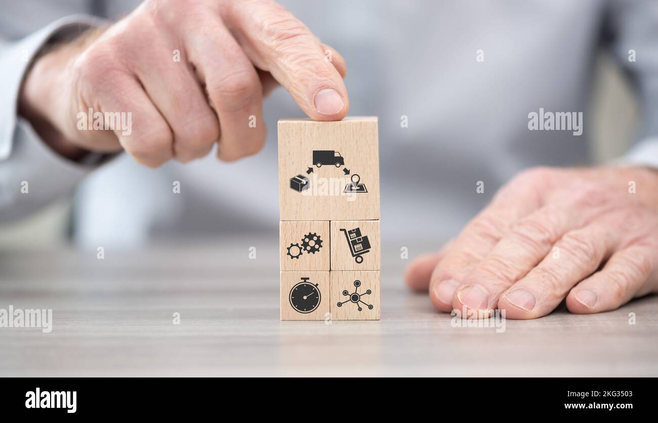 Wooden blocks with symbol of delivery concept Stock Photo - Alamy