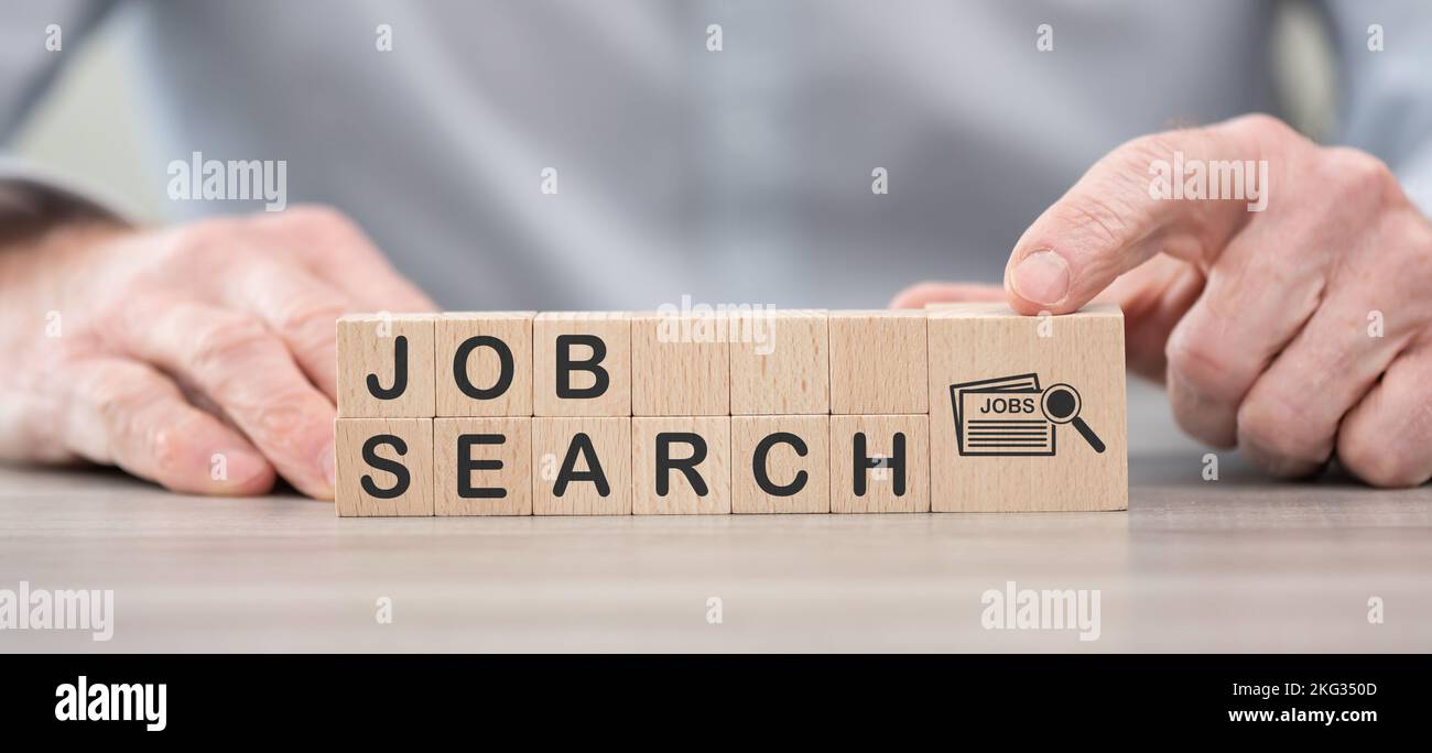 Wooden blocks with symbol of job search concept Stock Photo - Alamy