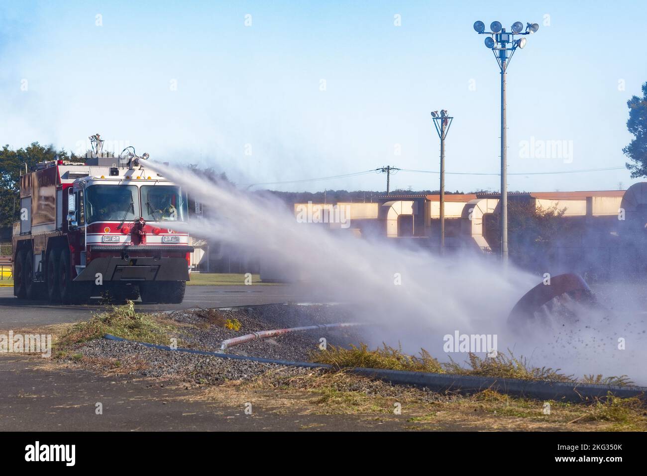 Firefighters from the 374th Civil Engineer Squadron use fire truck ...