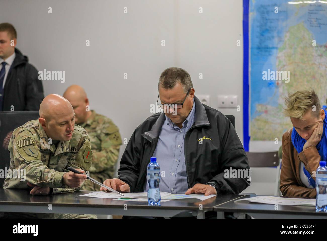 Jon Tester, middle, a Montana U.S. Senator and Ms. Kate Käufer, right ...