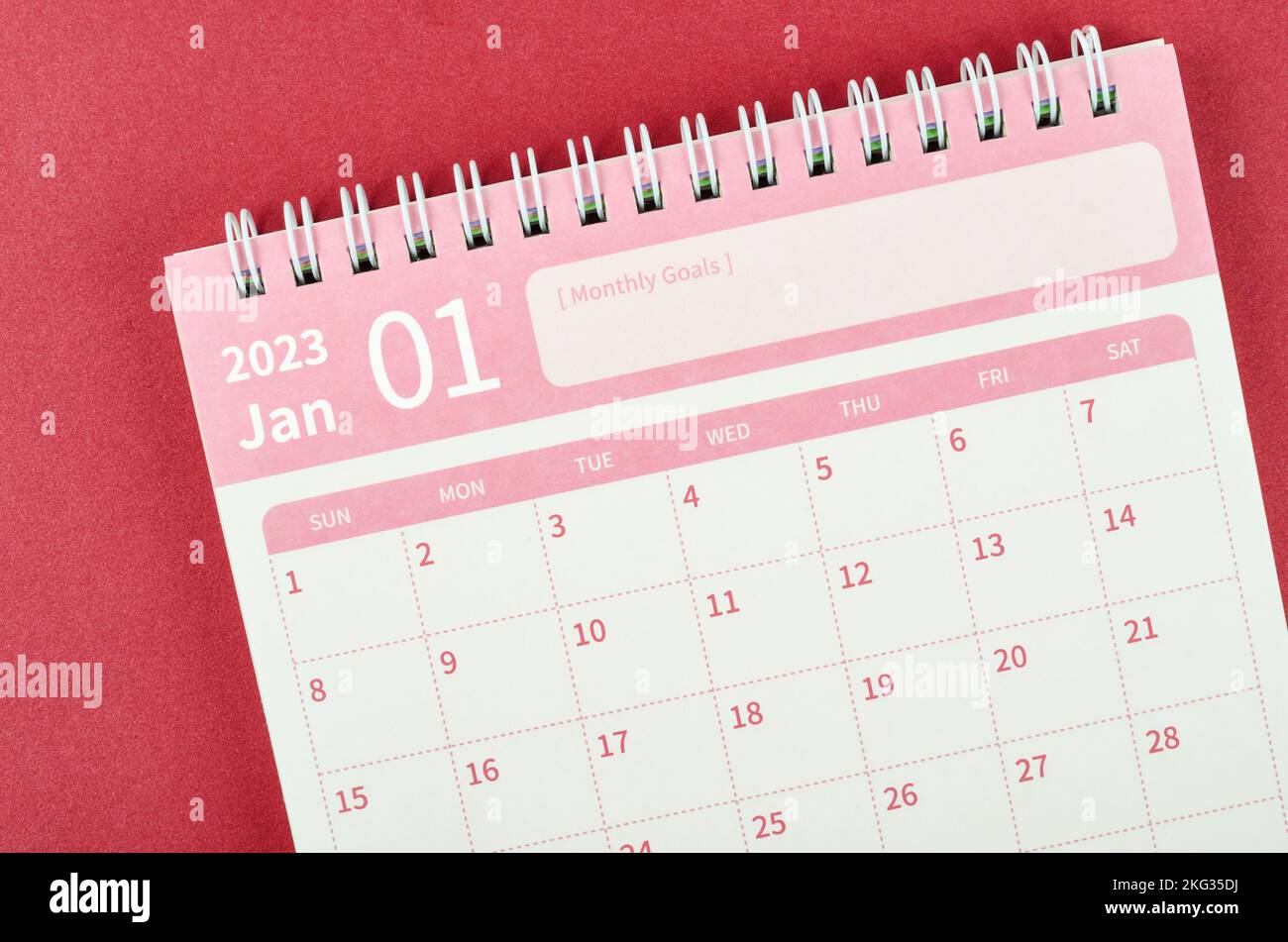 January 2023 Monthly desk calendar for 2023 year on red colour ...