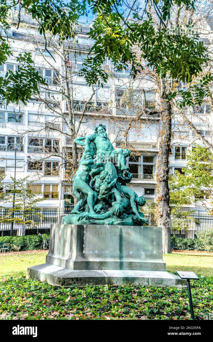 The blue bronze statue of Silenius on a donkey surrounded by followers ...