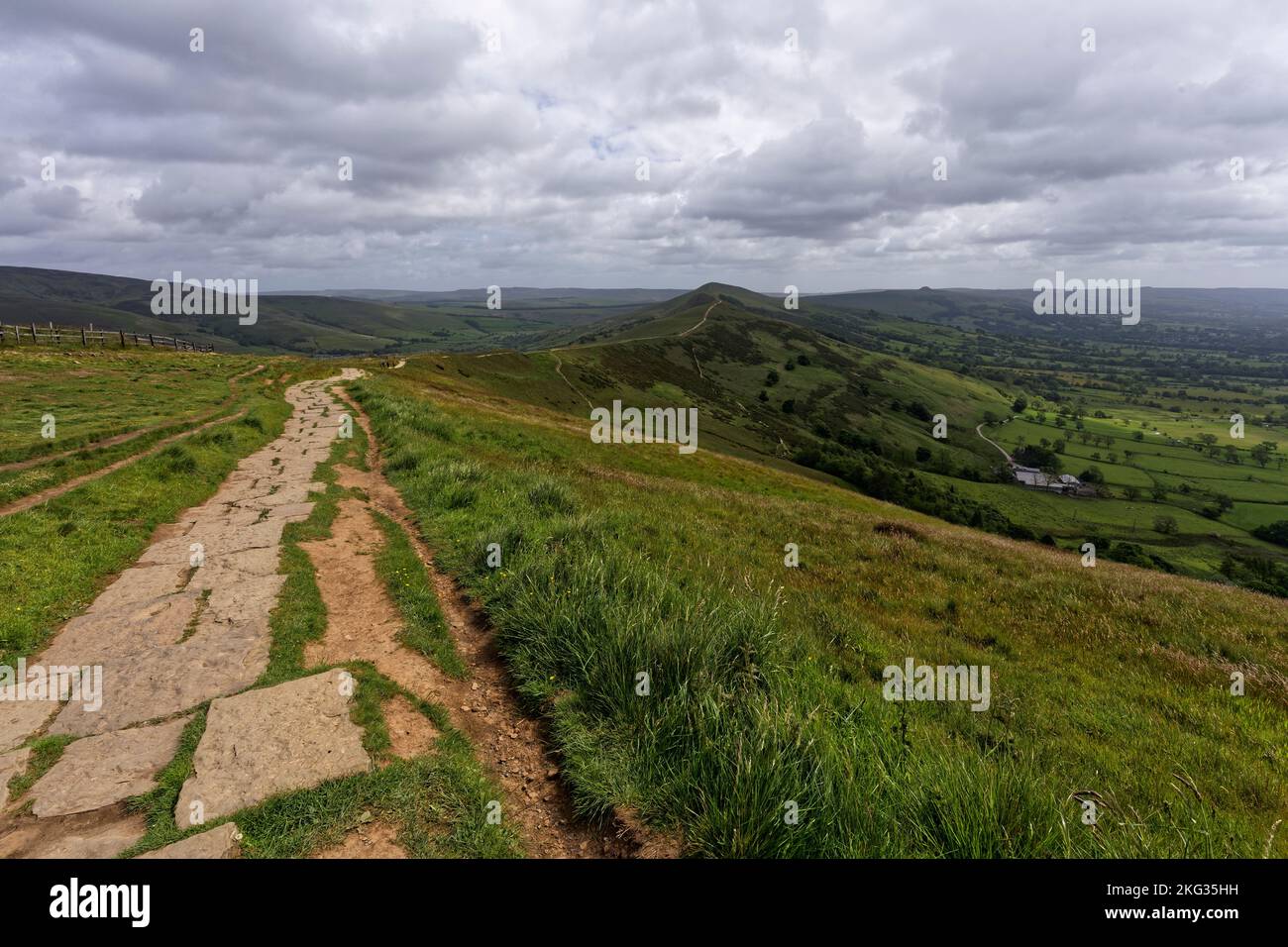 High on the Mam Tor ridgeline as dark rain clouds fill the sky Stock ...
