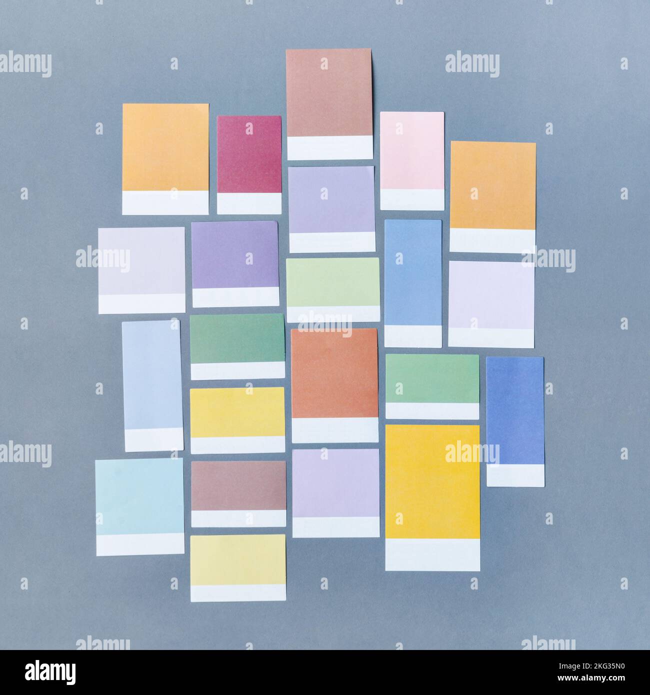 Colorful blank notes adhesives paper for your text or message on grey ...