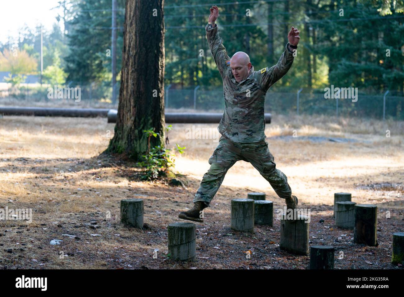Sgt. 1st Class Cory Fowler from Madigan Army Medical Center, stretches ...