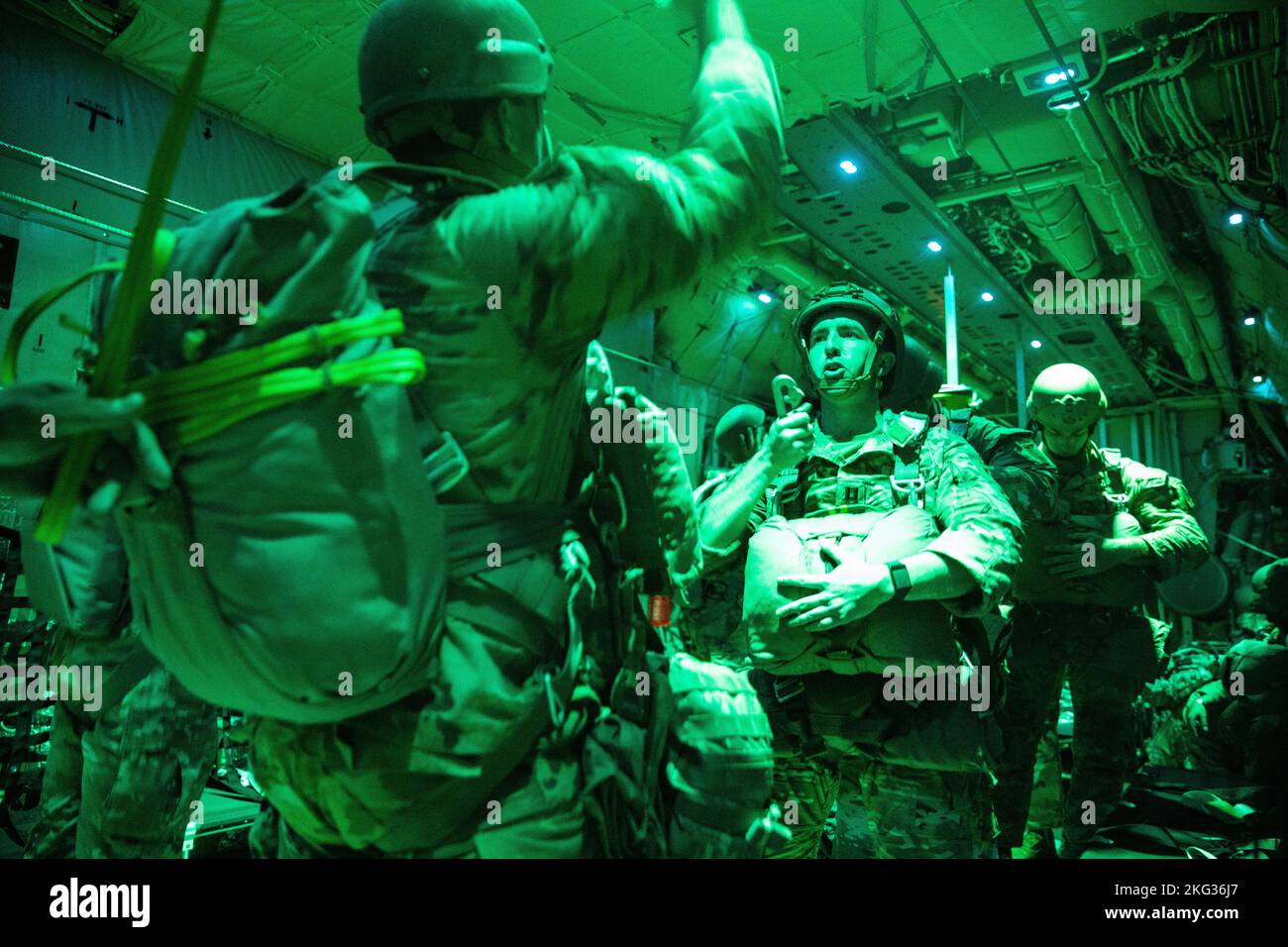 7th Special Forces Group (Airborne) paratroopers receive commands from ...