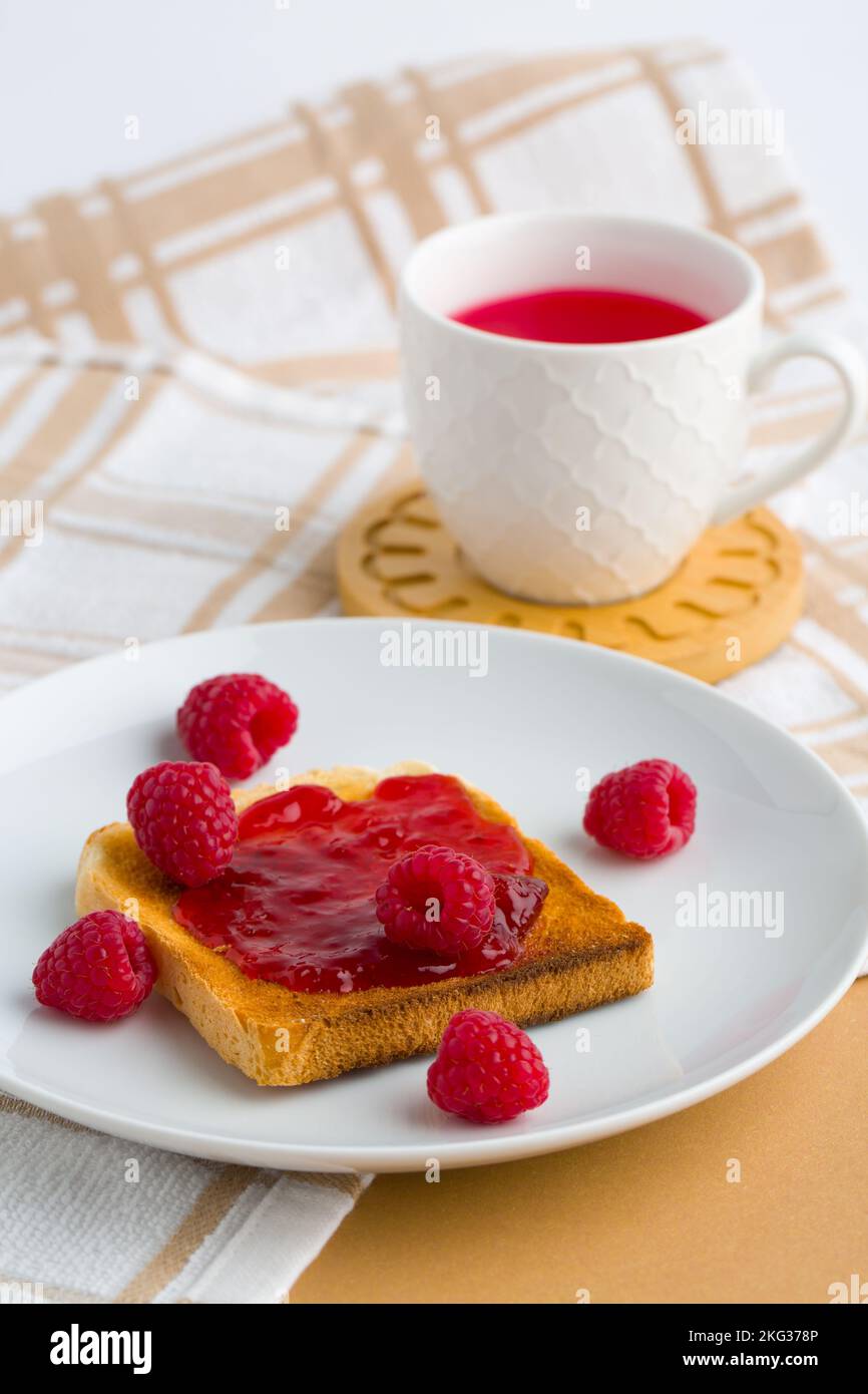 Cup of red tea and toasted bread Stock Photo - Alamy