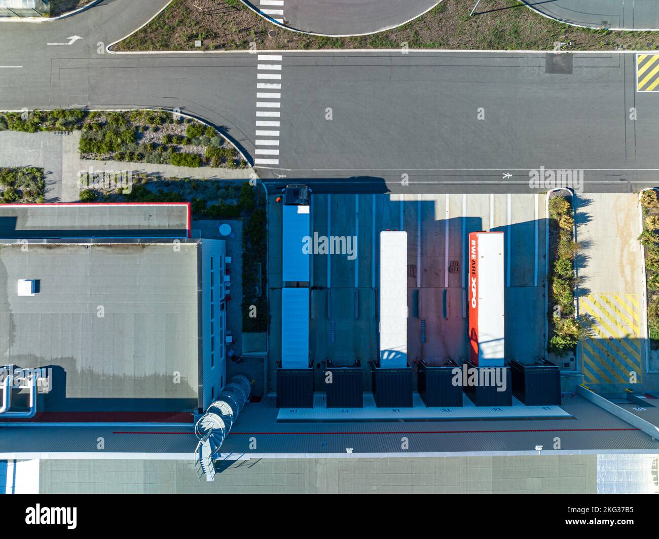 Top down shot of loading dock warehouse area where trucks parked in the ...