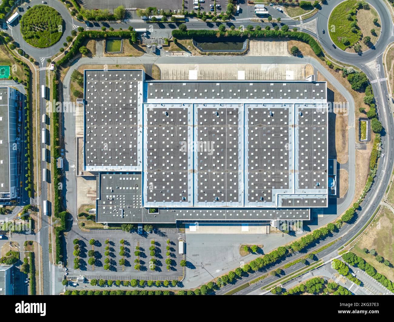 Panoramic top down shot of Industrial warehouse area where many trucks ...