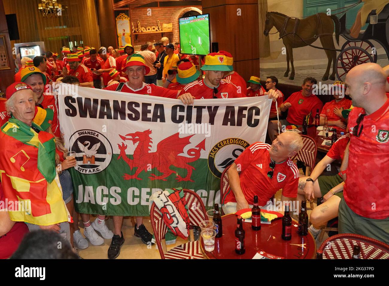 Wales football fans watch the England v Iran game in La Parisienne bar ...
