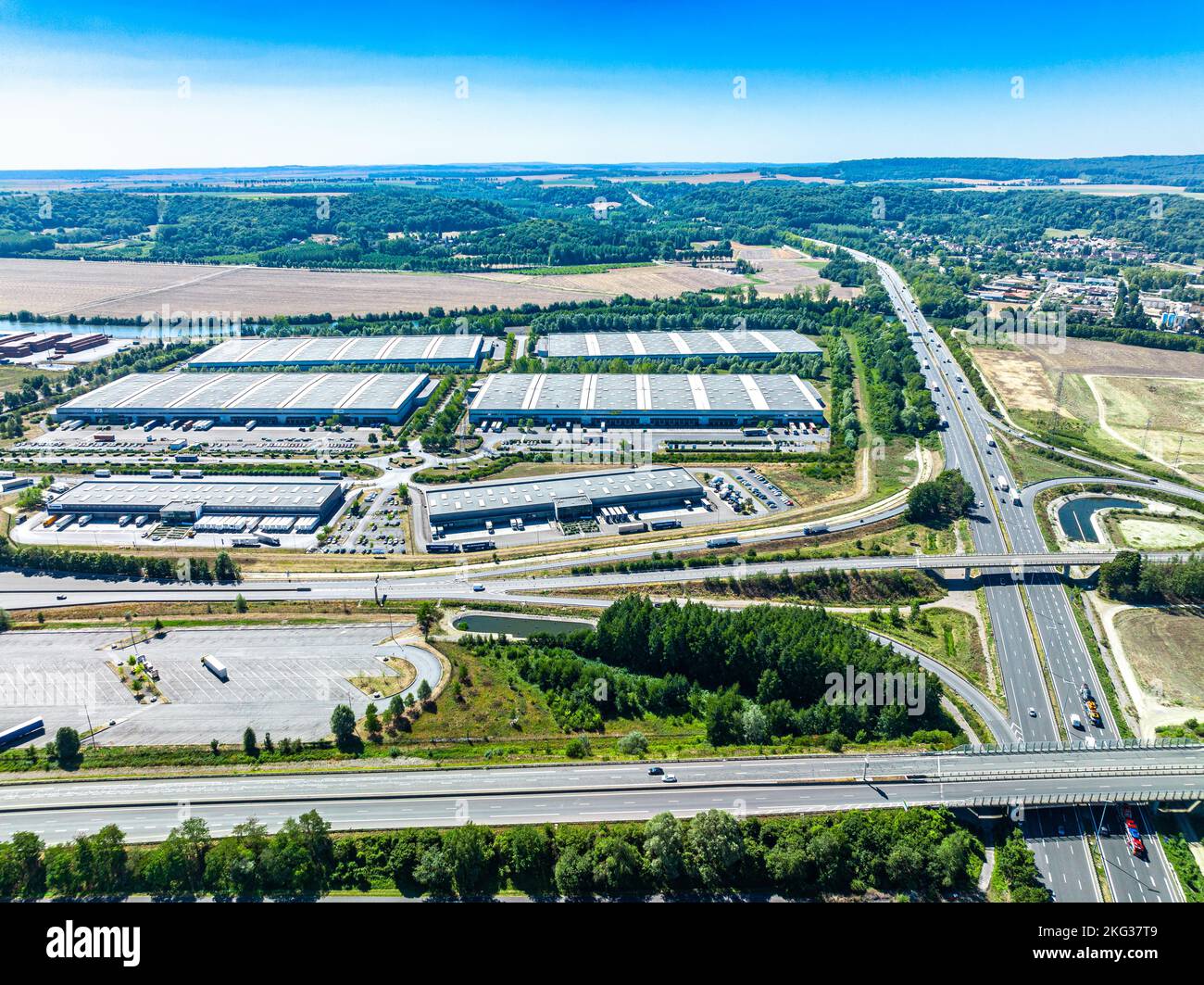 Aerial view of industrial city zone near national freeway Stock Photo ...
