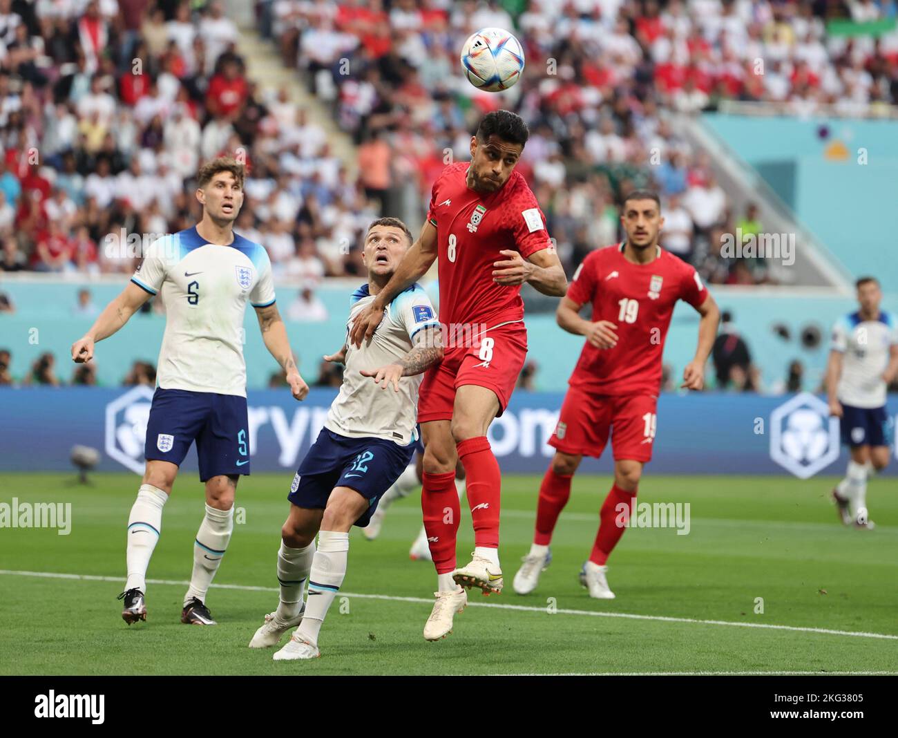 Doha, Qatar. 21st Nov, 2022. Morteza Pouraliganji (top) of Iran vies ...