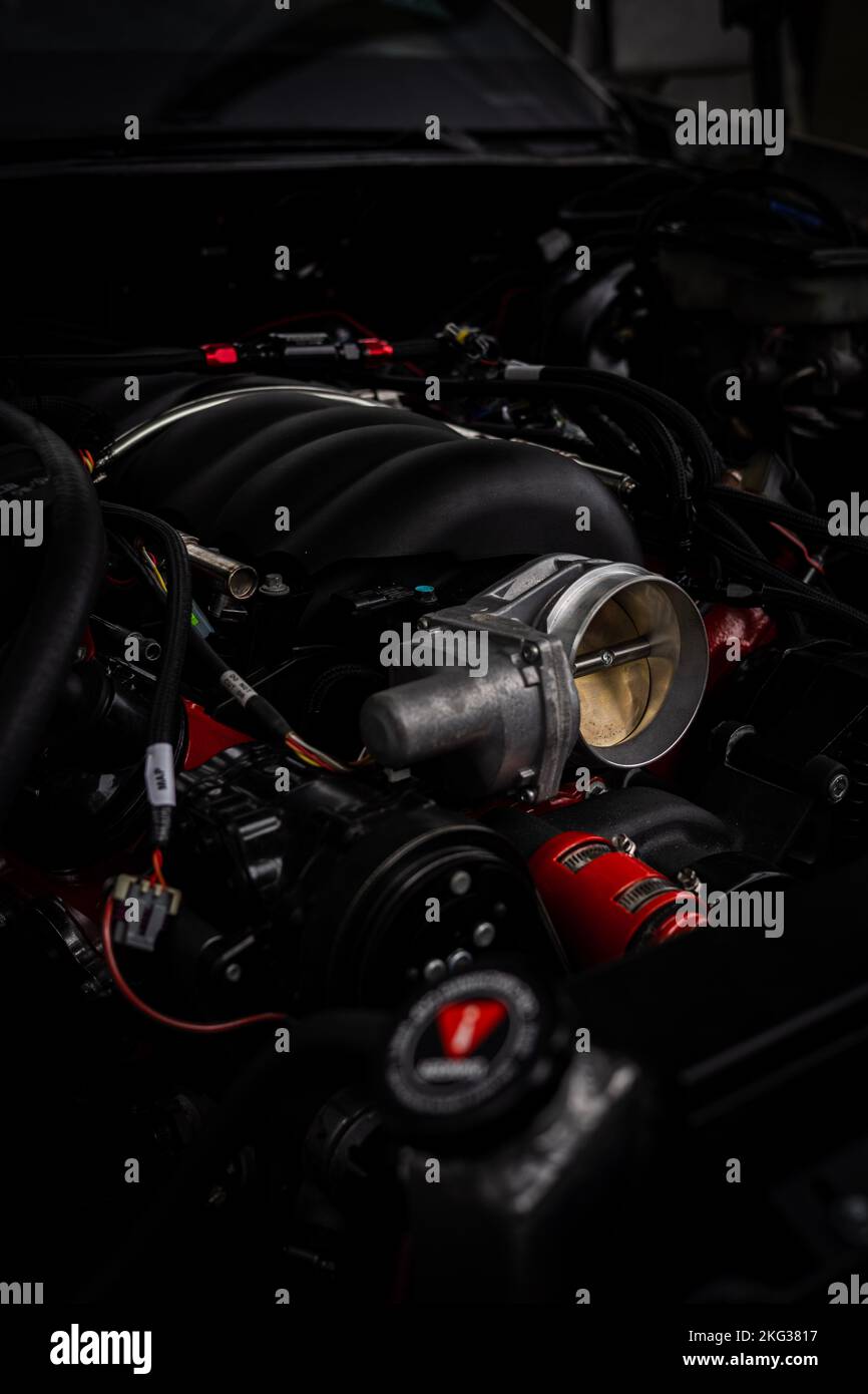 A vertical closeup of an engine on a modern car Stock Photo - Alamy