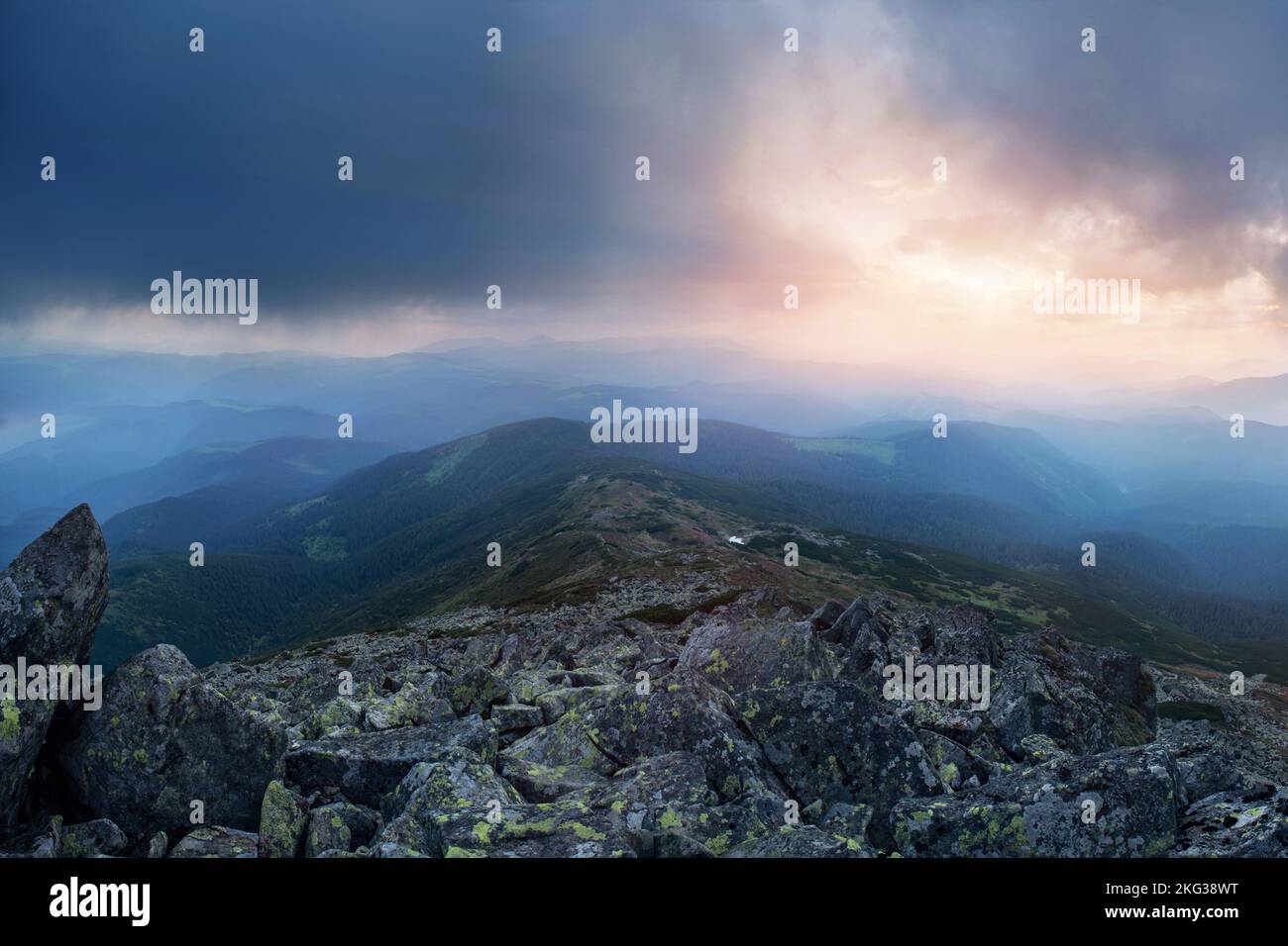 Dark mountain landscape with dramatic sky before the storm and rocks on ...