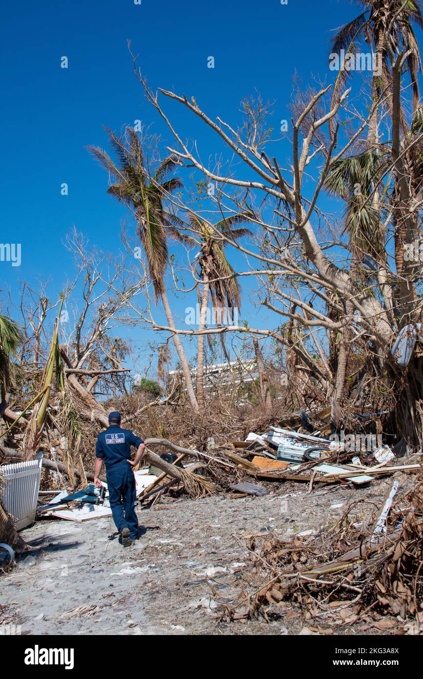 Coast Guard Petty Officer 1st Class Dustin Madden assesses potential ...