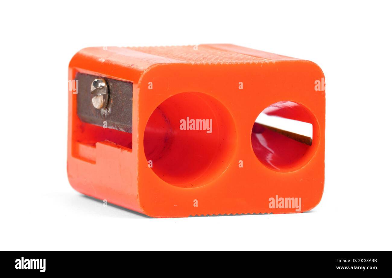 Close up old red pencil sharpener, isolated on white background ...