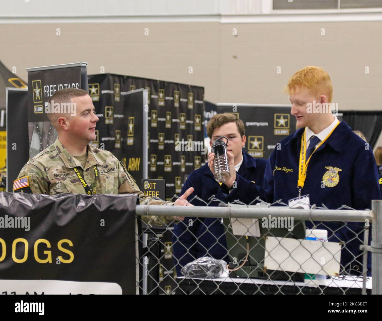 U.S. Army Sgt. 1st Class Shaun Moore and Staff Sgt. Marcus Caine ...